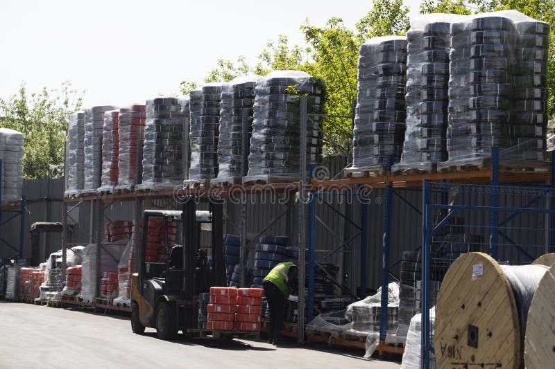 Utility Industrial Storage Site with Forklift and Electric Cable Spools ...