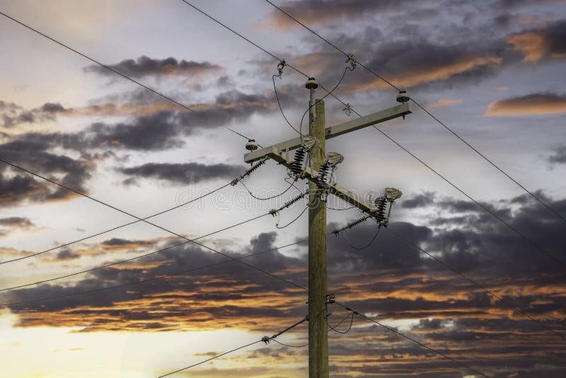 Utility Lines on a Power Pole at Sunset Stock Image - Image of industry ...