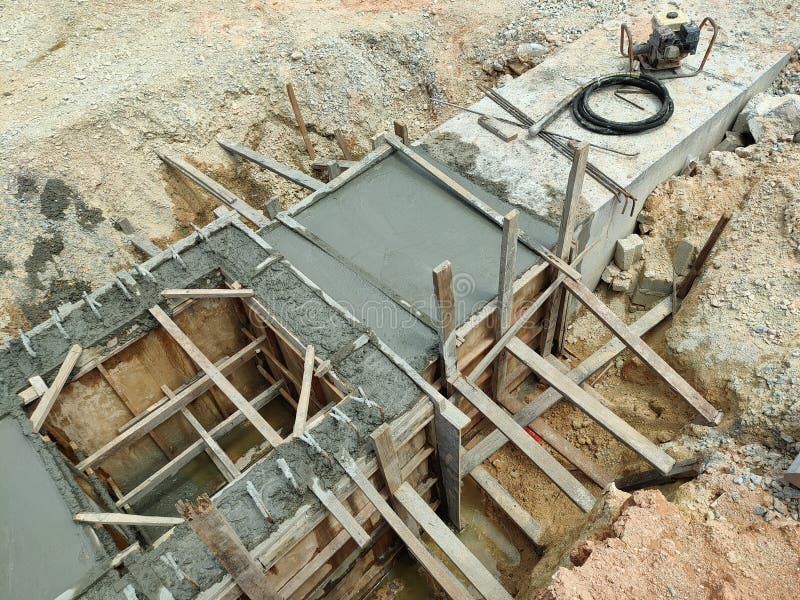 Utility Manhole Under Construction at a Construction Site. Editorial ...