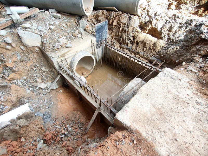 Utility Manhole Under Construction at a Construction Site. Editorial ...
