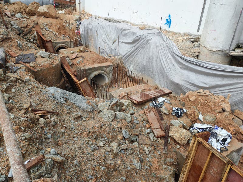 Utility Manhole Under Construction at a Construction Site. Editorial ...