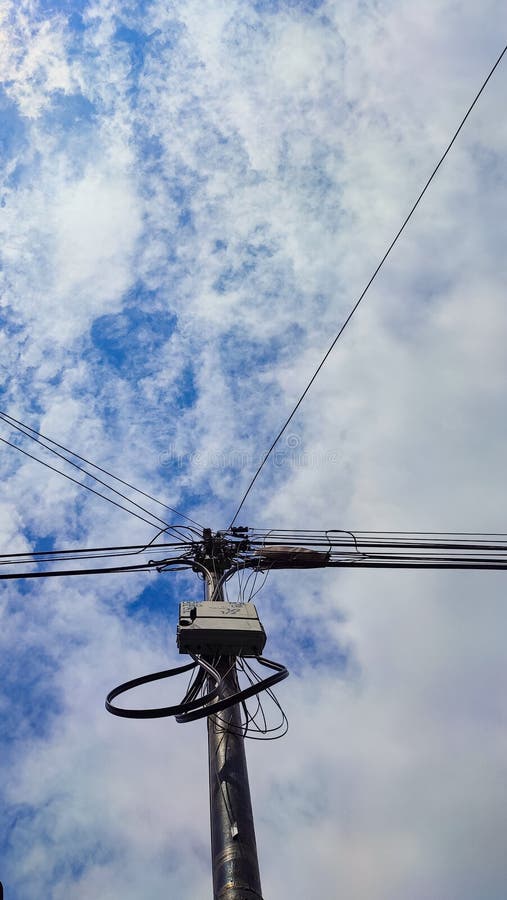 Utility pole and blue sky stock photo. Image of cloud - 224160598