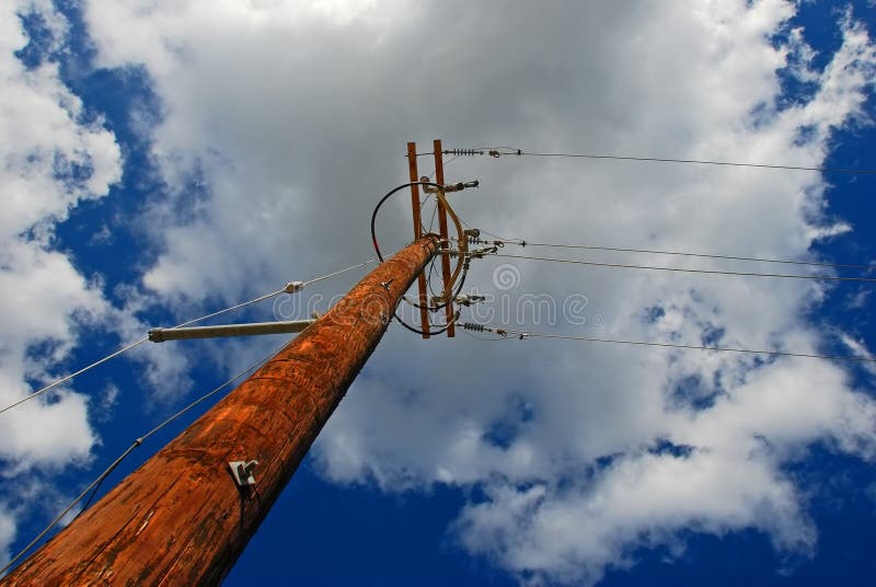 Utility pole on blue sky stock image. Image of bolt, cross - 7491887