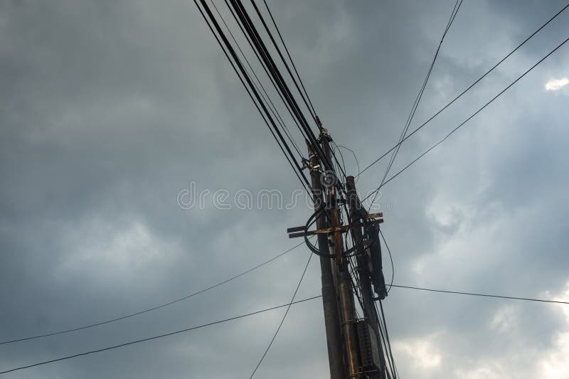 Utility Pole and Cloudy Sky Stock Photo - Image of infrastructure, dark ...