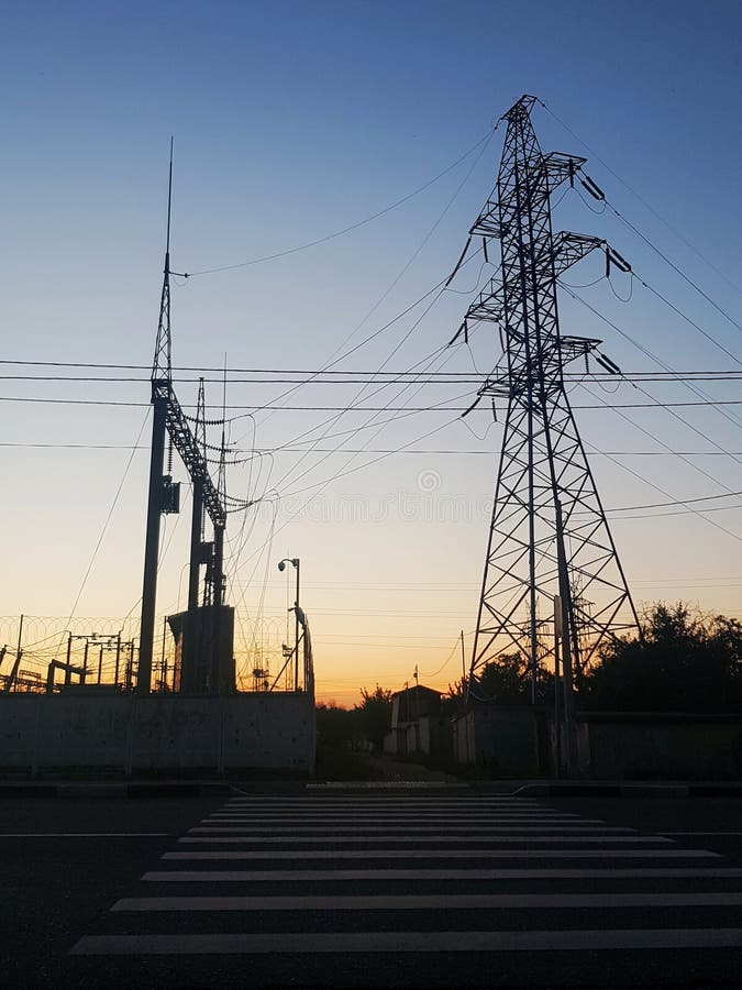 Utility pole at sunset stock image. Image of distribution - 120233597