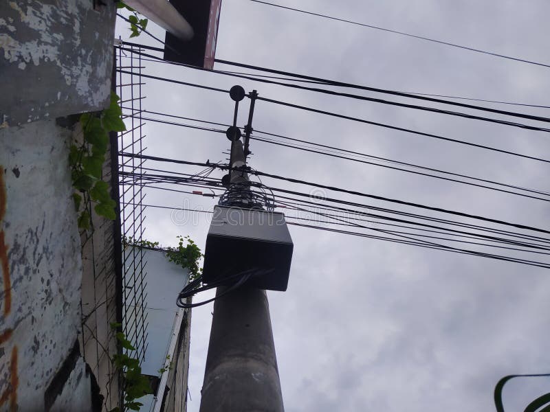 Utility Pole with Tangled Electrical Wires Stock Image - Image of pole ...