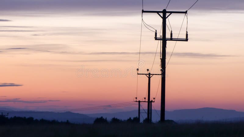 Utility poles stock image. Image of overhead, evening - 46523169