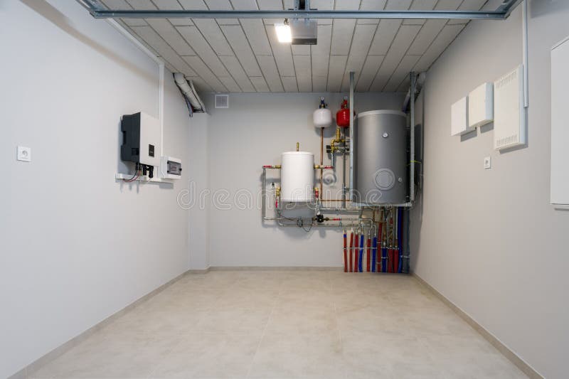 Utility Room, Garage with Water Heaters and Electrical Components Stock ...
