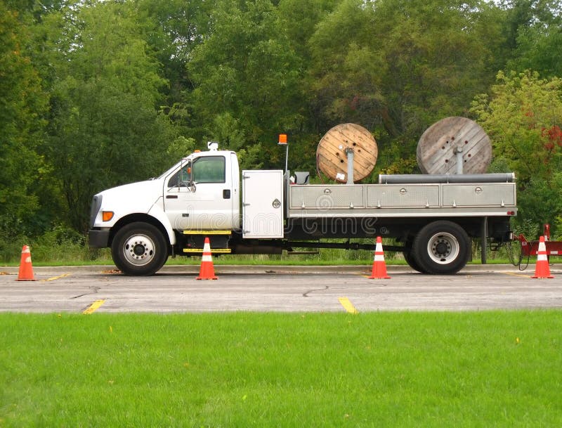 Old Utility Truck Moving on Asphalt Road Under Rainy Day - Close-up ...