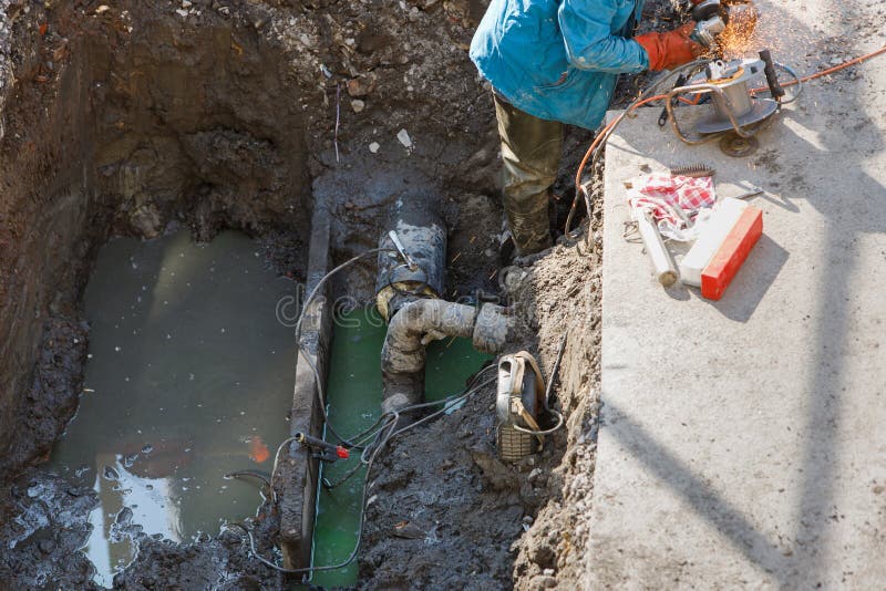 Utility Worker Fixing Broken Water Main, Top View Stock Image - Image ...
