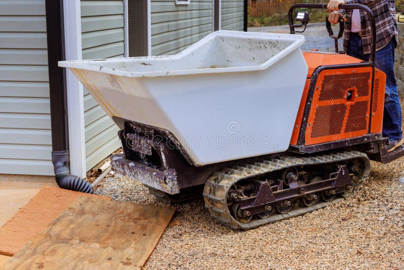 Utilization of a Self Dumping Rubber Track Concrete Truck for ...