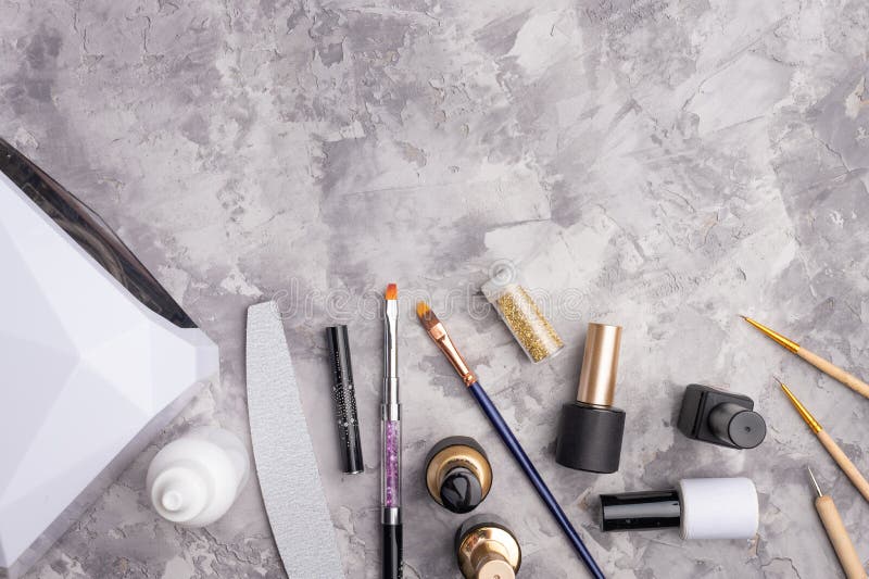 UV Manicure Nail Care Tools. on Concrete Texture with Space Stock Photo ...