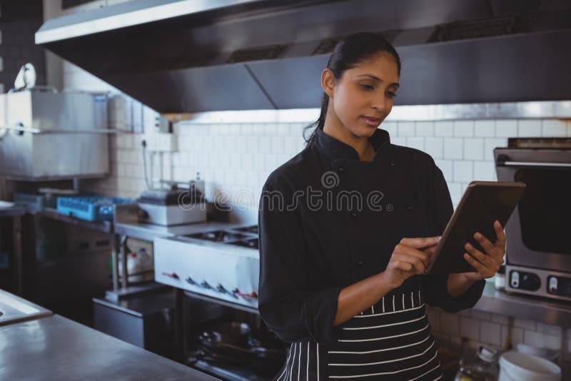 Waitress Using Tablet in Cafe Stock Image - Image of drink, connection ...