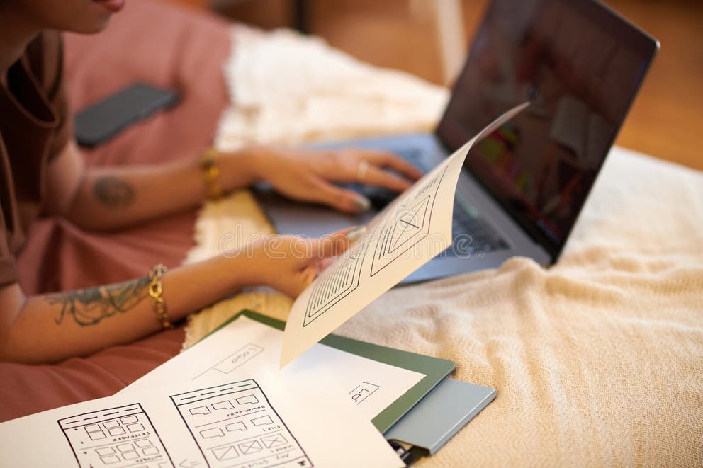 UX Designer Checking Documents with App Wireframes Stock Photo - Image ...