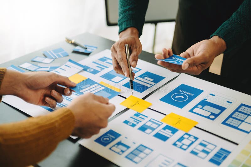 UX Developer and Ui Designer Brainstorming about Mobile App Interface ...