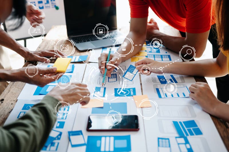 Ux Developer And Ui Designer Brainstorming About Mobile App Interface Wireframe Design With