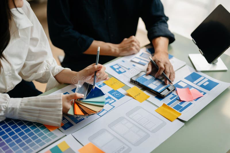 UX Developer and Ui Designer Brainstorming about Mobile App Interface ...