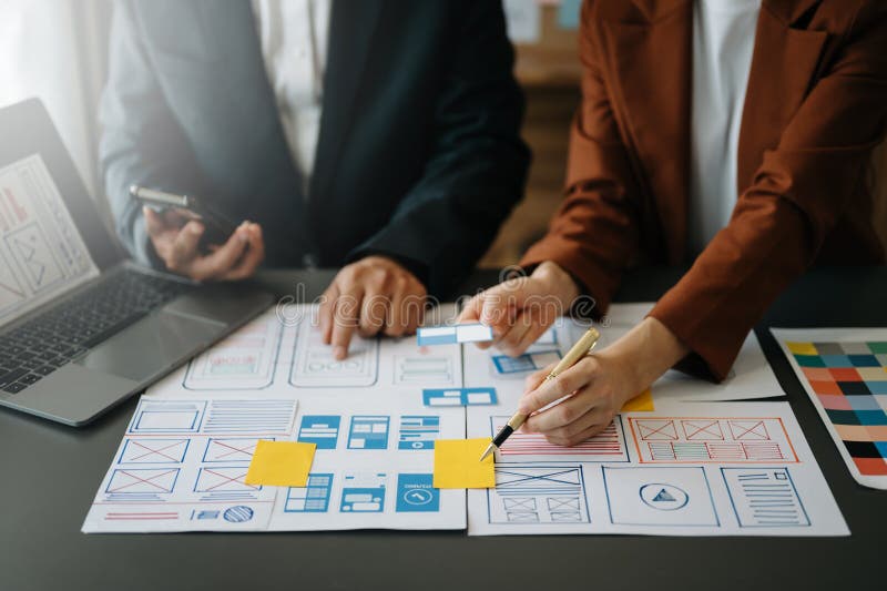 UX Developer and Ui Designer Brainstorming about Mobile App Interface ...