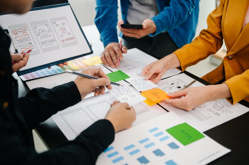 UX Developer and Ui Designer Brainstorming about Mobile App Interface ...