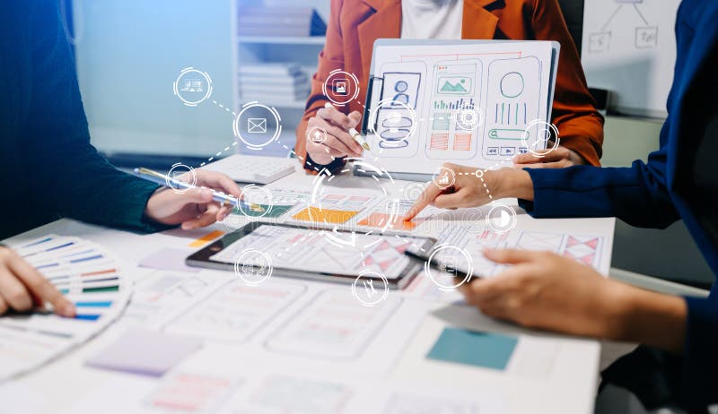 Ux Developer And Ui Designer Brainstorming About Mobile App Interface Wireframe Design With