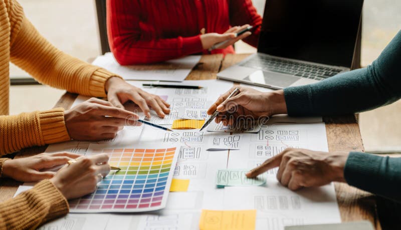 Ux Developer And Ui Designer Brainstorming About Mobile App Interface