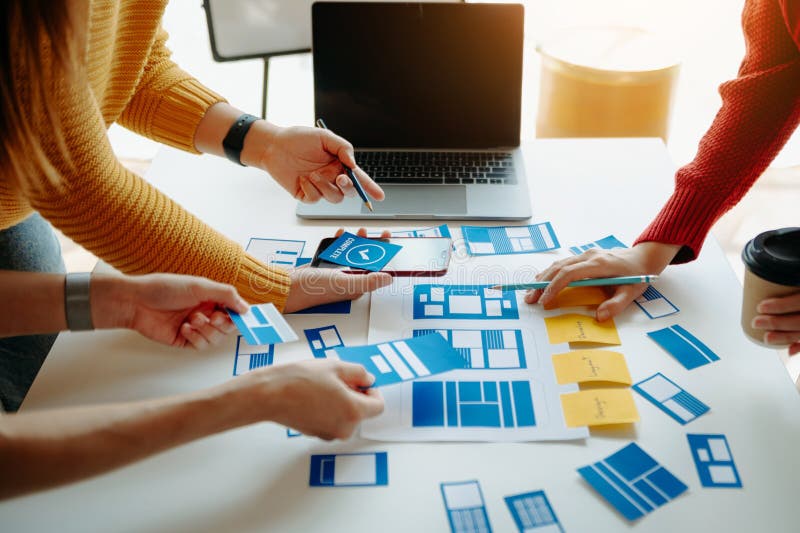 UX Developer and Ui Designer Brainstorming about Mobile App Interface ...