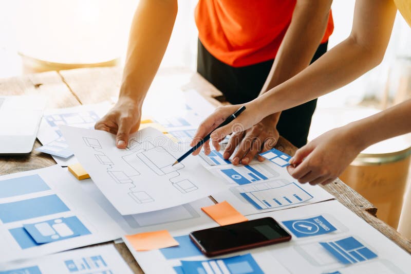 UX Developer and Ui Designer Brainstorming about Mobile App Interface ...