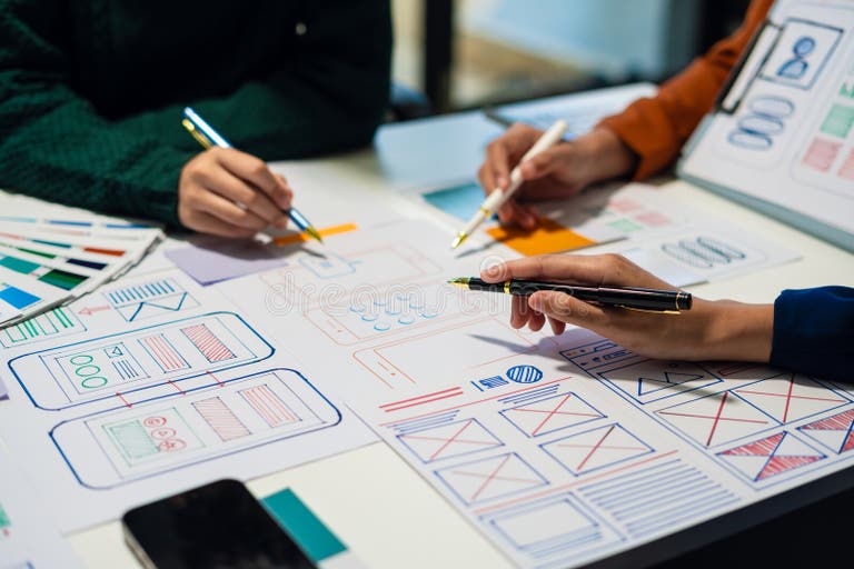 UX Developer and Ui Designer Brainstorming about Mobile App Interface ...