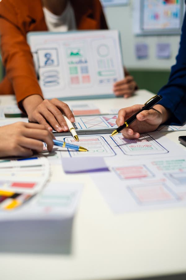 UX Developer and Ui Designer Brainstorming about Mobile App Interface ...