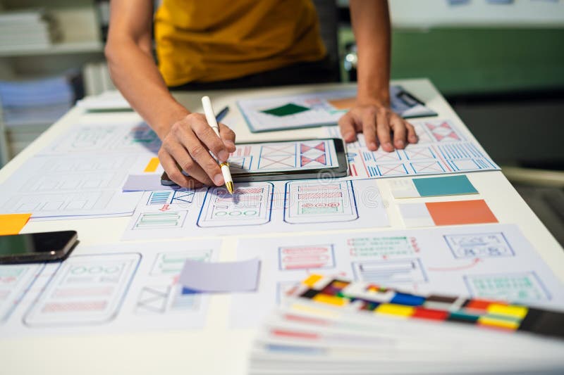 UX Developer and Ui Designer Brainstorming about Mobile App Interface ...