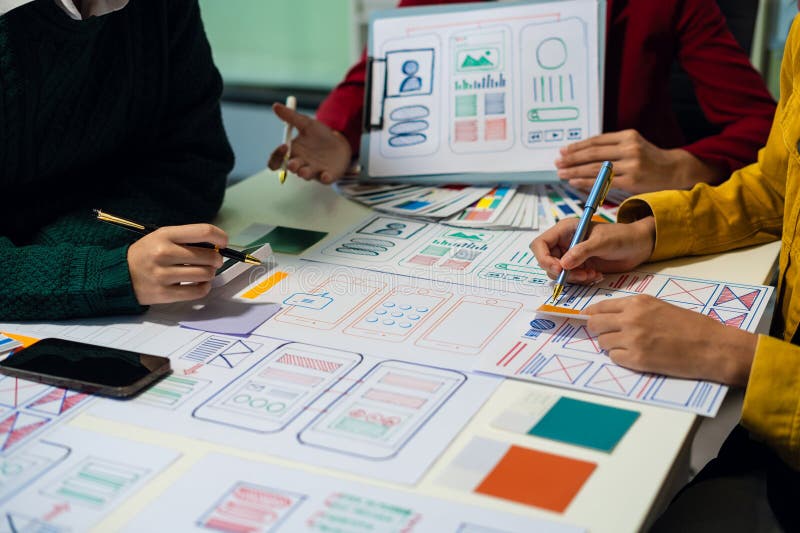 UX Developer and Ui Designer Brainstorming about Mobile App Interface ...