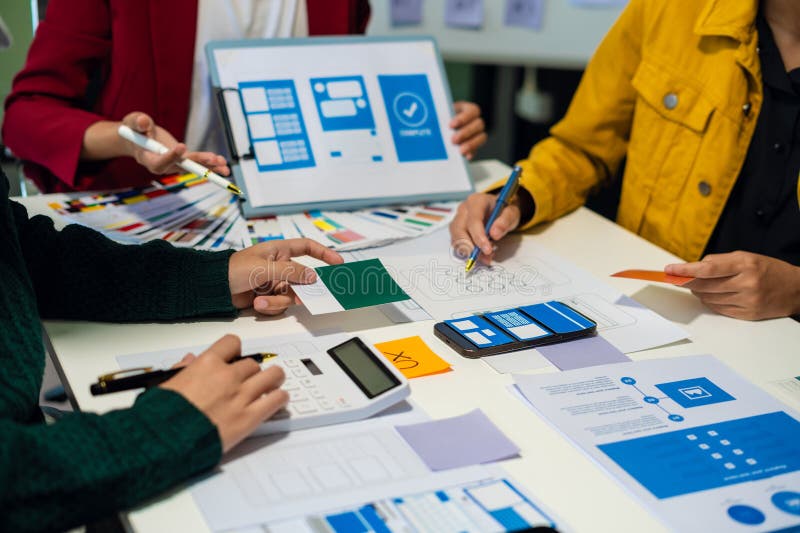 UX Developer and Ui Designer Brainstorming about Mobile App Interface ...