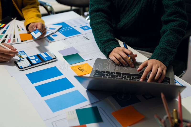 UX Developer and Ui Designer Brainstorming about Mobile App Interface ...