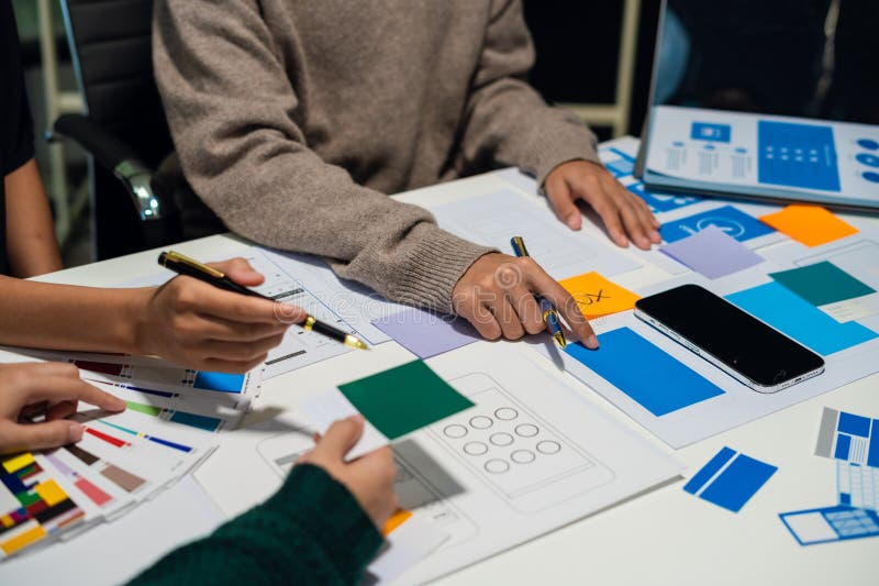 UX Developer and Ui Designer Brainstorming about Mobile App Interface ...