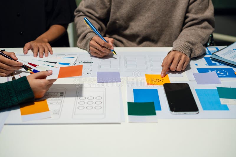 UX Developer and Ui Designer Brainstorming about Mobile App Interface ...