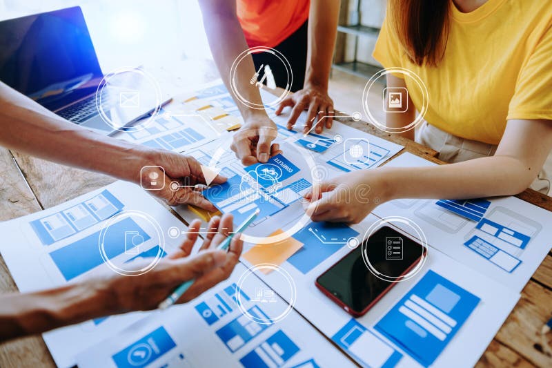 Ux Developer And Ui Designer Brainstorming About Mobile App Interface Wireframe Design With