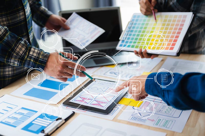 Ux Developer And Ui Designer Brainstorming About Mobile App Interface Wireframe Design With