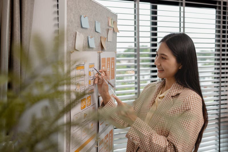 Ux Developer and Ui Designer Brainstorming about Mobile App Interface ...