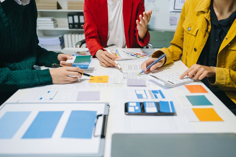 Ux Developer And Ui Designer Brainstorming About Mobile App Interface