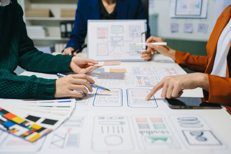 Ux Developer And Ui Designer Brainstorming About Mobile App Interface Wireframe Design Stock