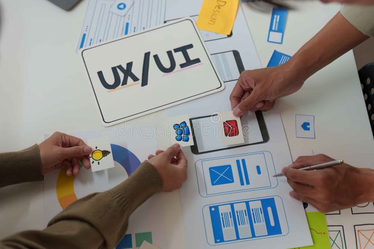 UX UI Design Workshop. Team Members Collaborating on User Interface Sketches. Stock Photo ...