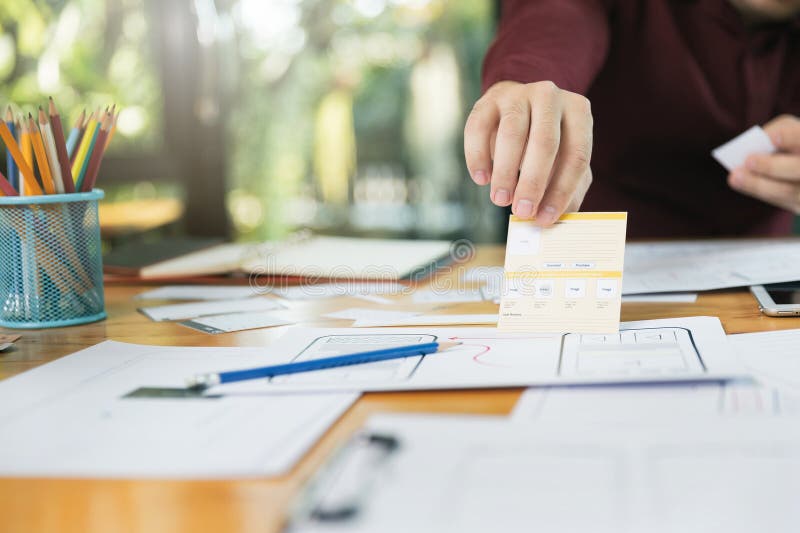 UX or UI Designers Designing on Digital Tablet and Smartphone ...