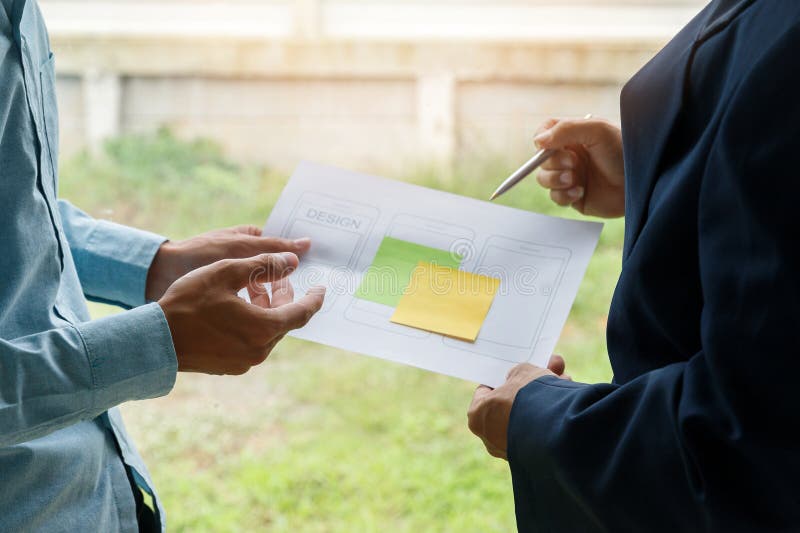 UX or UI Designers Designing on Their Smartphone Application Layout ...