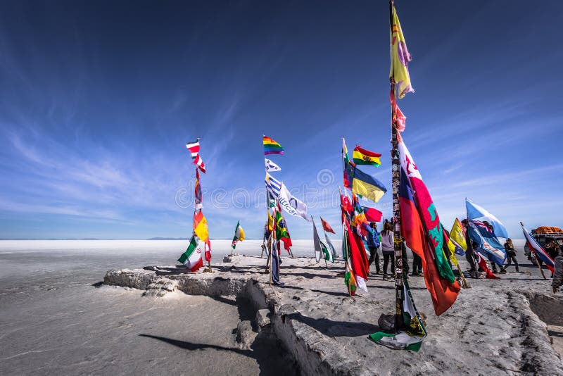 Uyuni Salt Flats - July 20, 2017: Flags Landmark at the Uyuni Salt ...