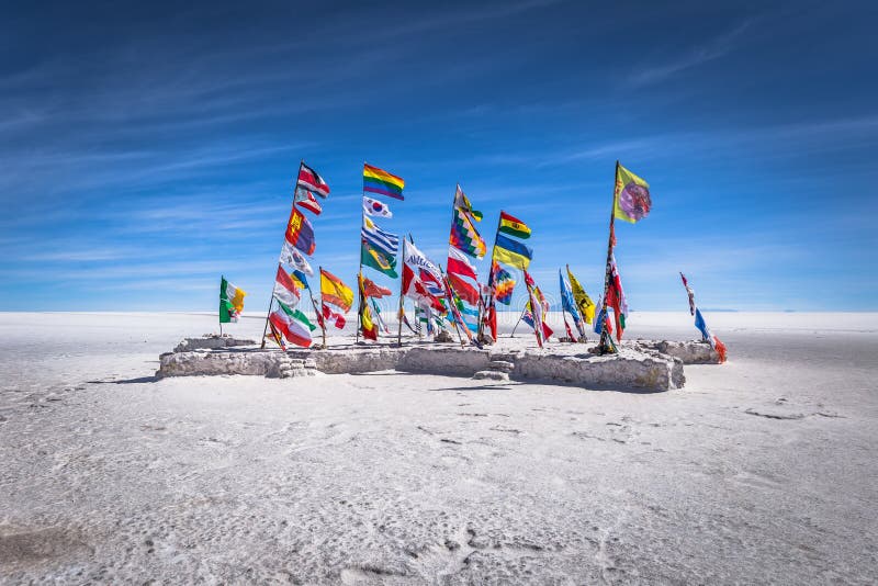 Uyuni Salt Flats - July 20, 2017: Flags Landmark at the Uyuni Salt ...