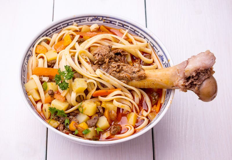 Uzbek Noodle Soup Lagman with Large Bone Stock Photo - Image of food ...