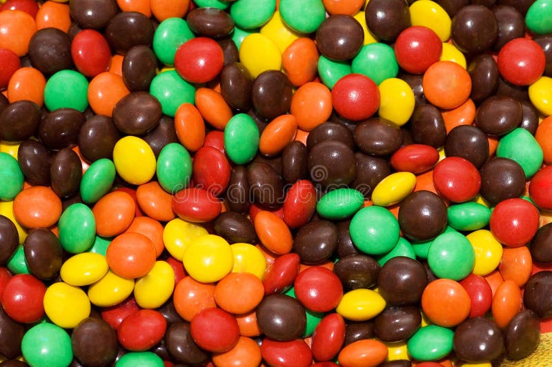 Doces De Chocolate Coloridos Imagem de Stock - Imagem de doce, redondo ...