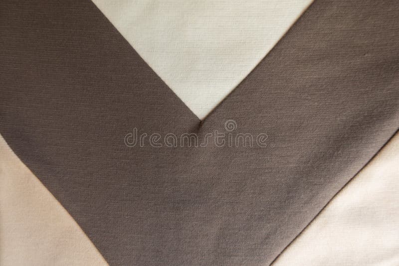 V-shaped Brown Stripe Sewn To Beige Fabric Stock Image - Image of ...