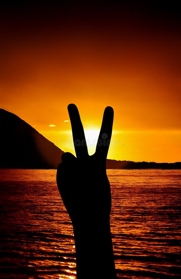 V-sign at sunset stock image. Image of life, mountain - 63258959