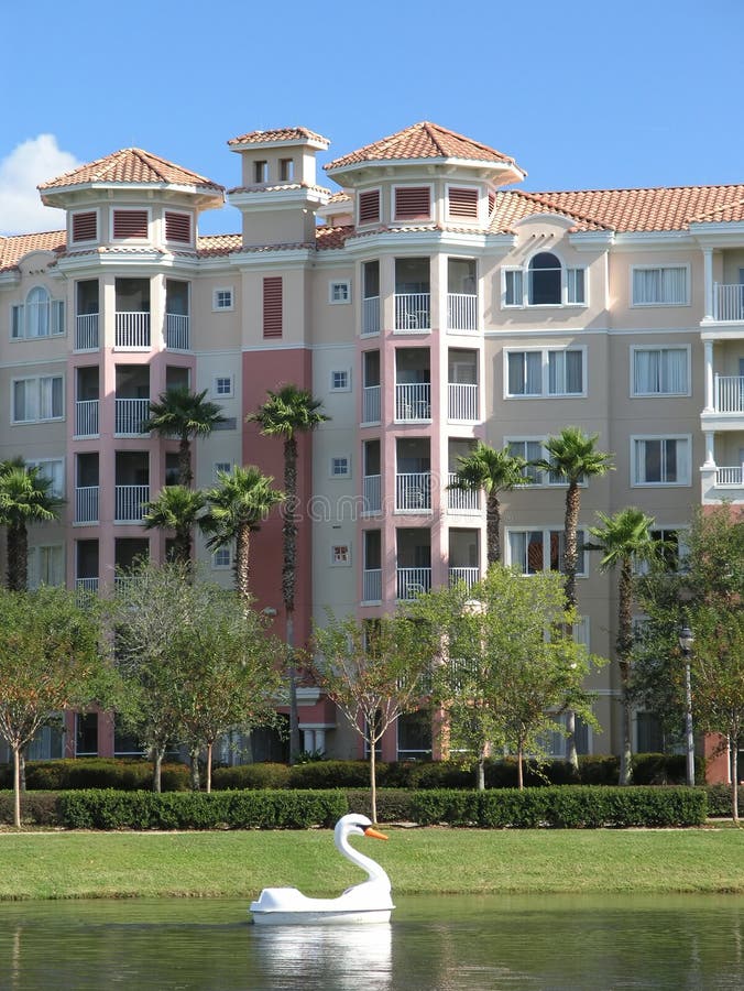 Vacation Resort Buildings & Swan Lake Stock Photo - Image of lagoon ...
